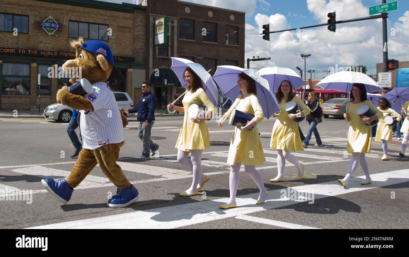 Morton Salt Girls and Clark, the Cubs new mascot, walk across Clark ...
