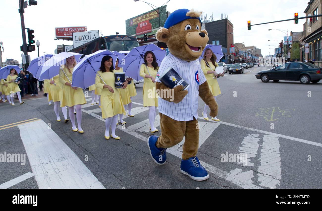 Morton Salt Girls and Clark, the Cubs new mascot, walk across Clark ...