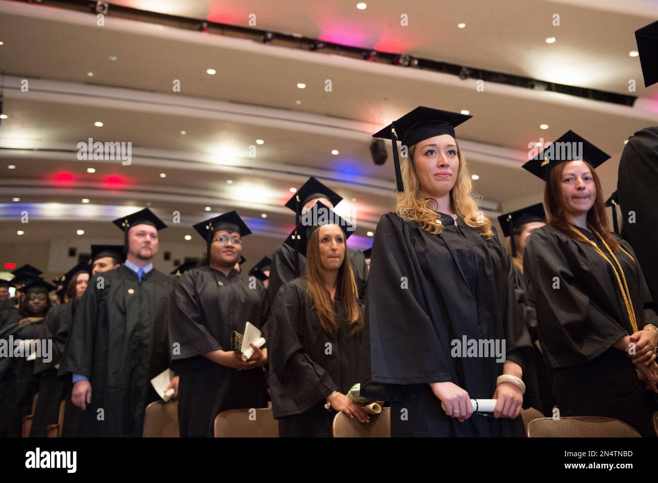 Members of the New England College of Business graduating class of 2014 ...