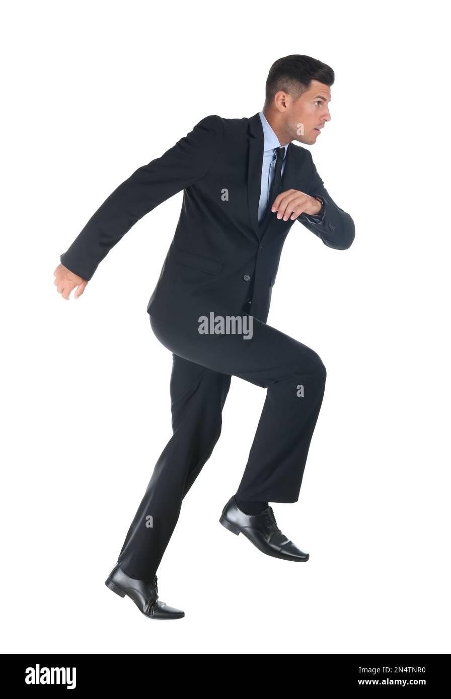Businessman imitating stepping up on stairs against white background ...