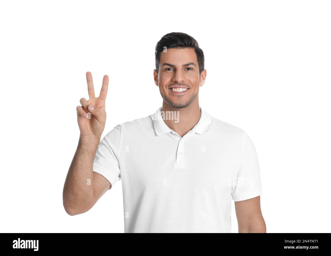 Man showing number two with his hand on white background Stock Photo ...