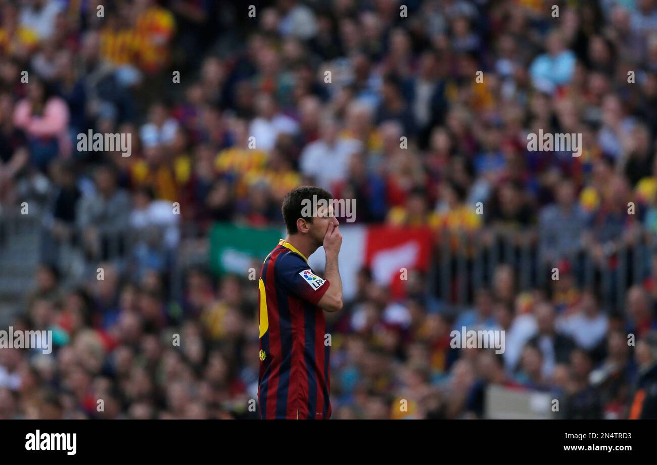 Barcelona's Lionel Messi from Argentina puts his hand on his mouth ...