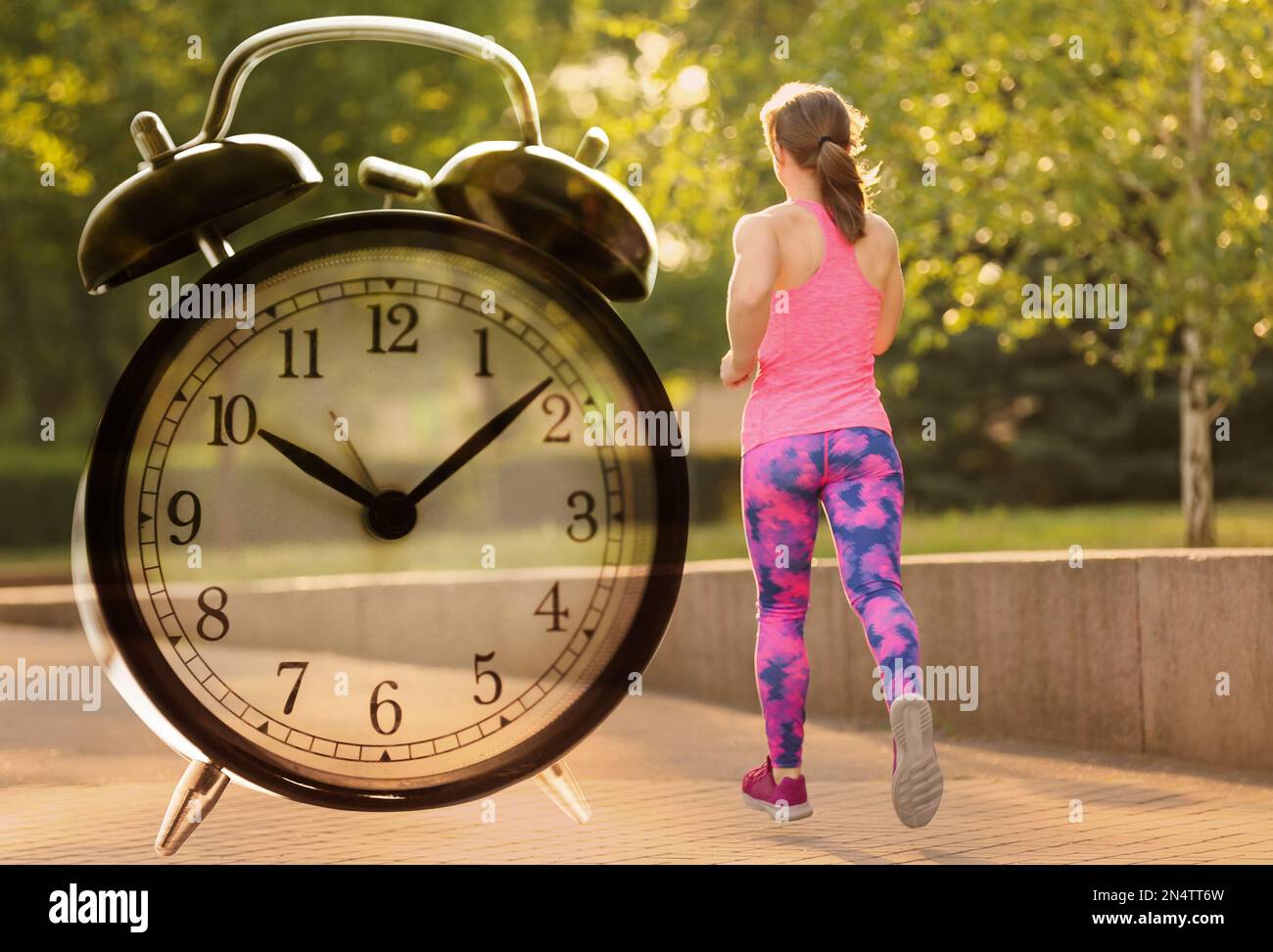 Time to do morning exercises. Double exposure of woman running in park ...