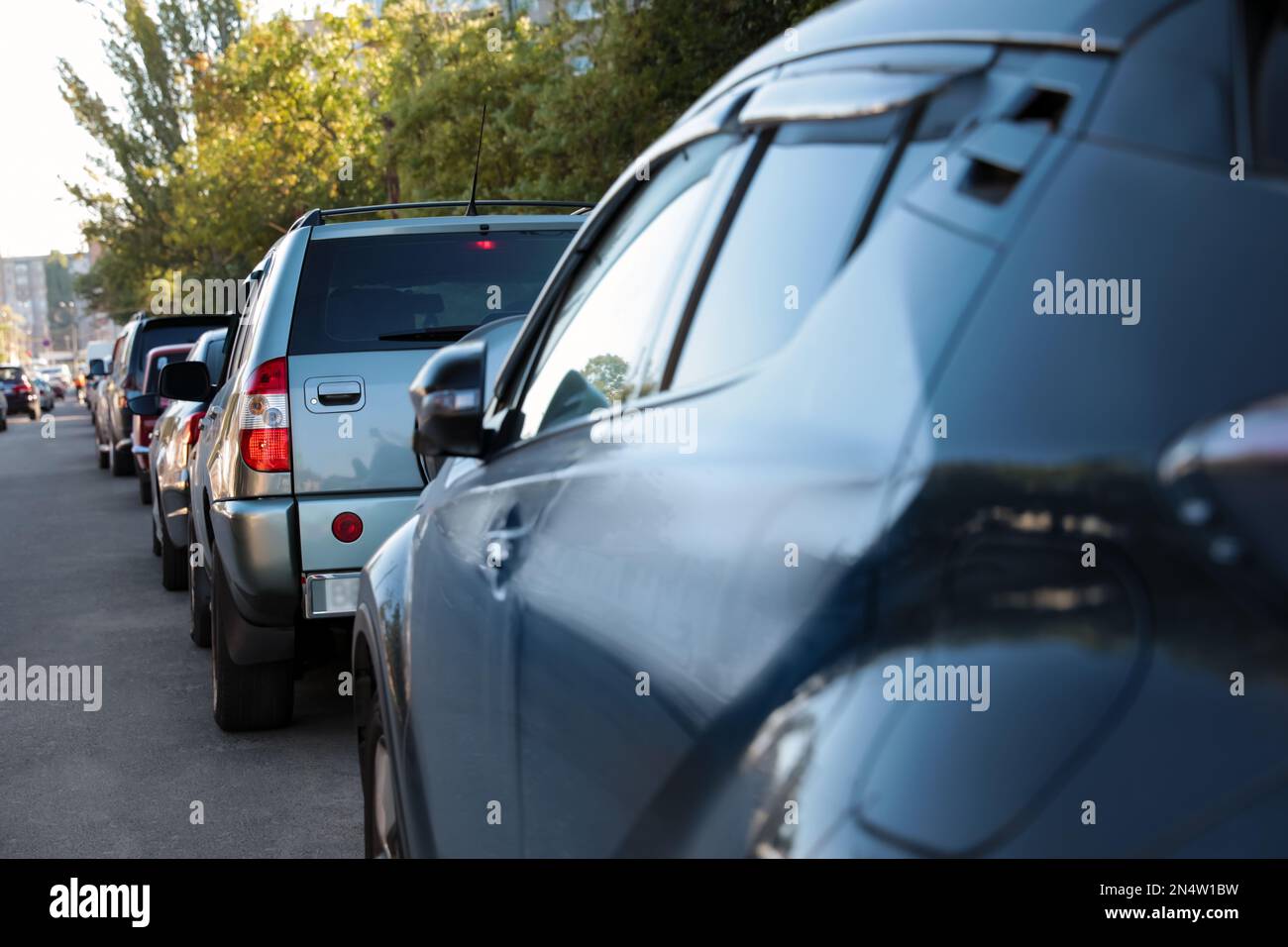 Cars in traffic jam on city street Stock Photo - Alamy