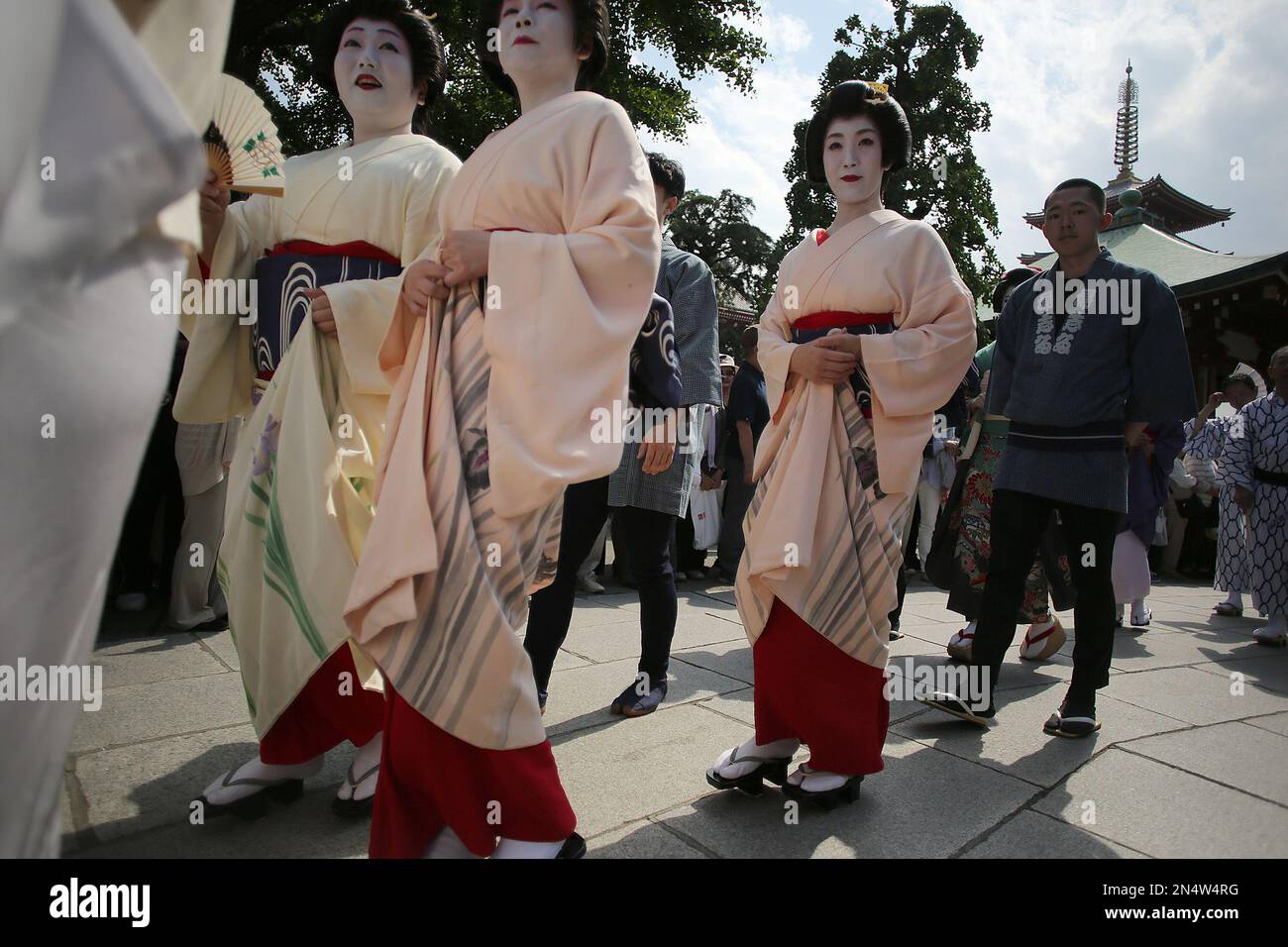 Geisha girls parade toward Asakusa Shrine in the compound of Sensoji ...