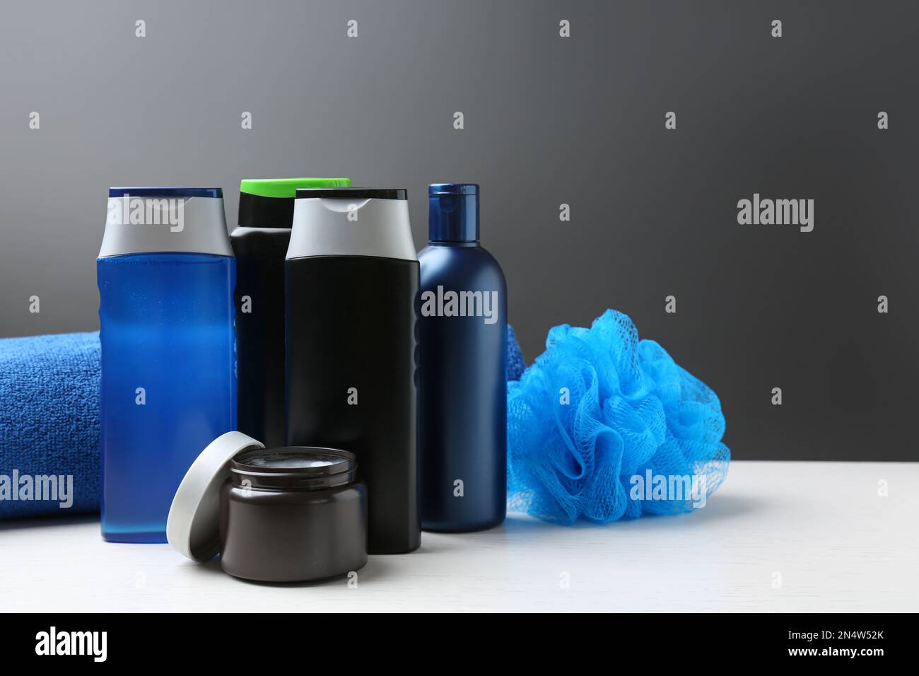 Set with men's personal hygiene products on white table. Space for text ...