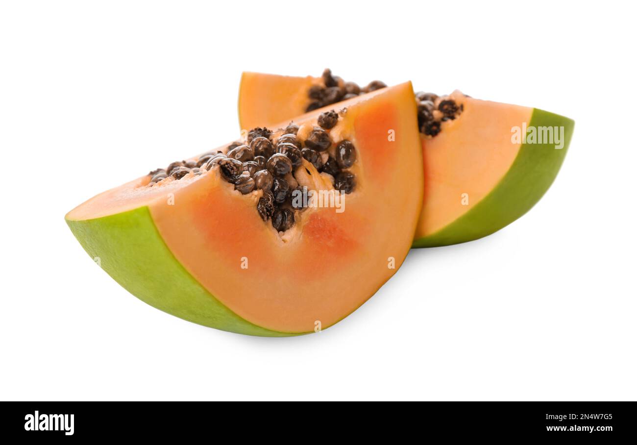 Fresh ripe papaya pieces on white background Stock Photo - Alamy