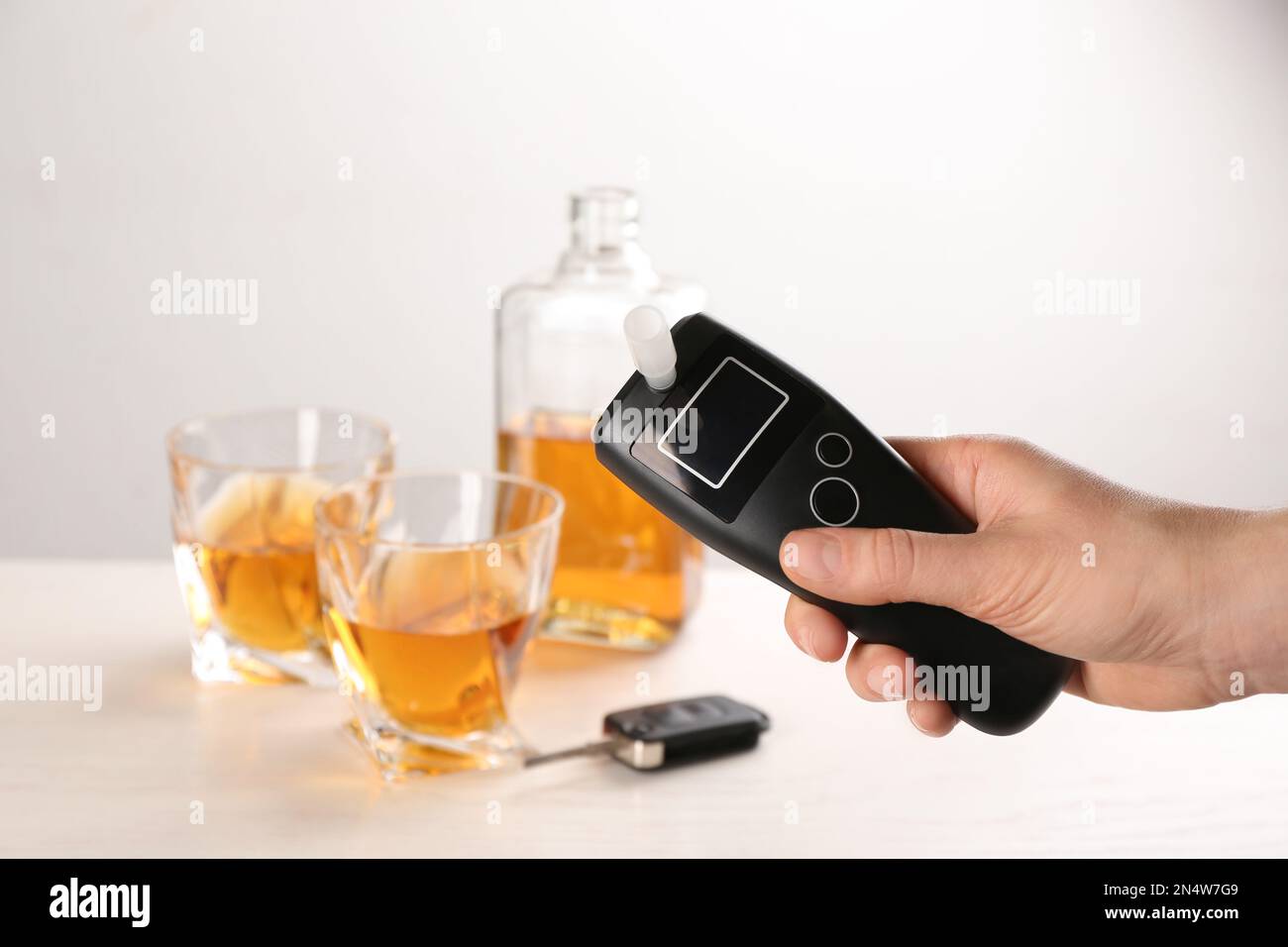 Female driver breathalyzer hi-res stock photography and images - Alamy