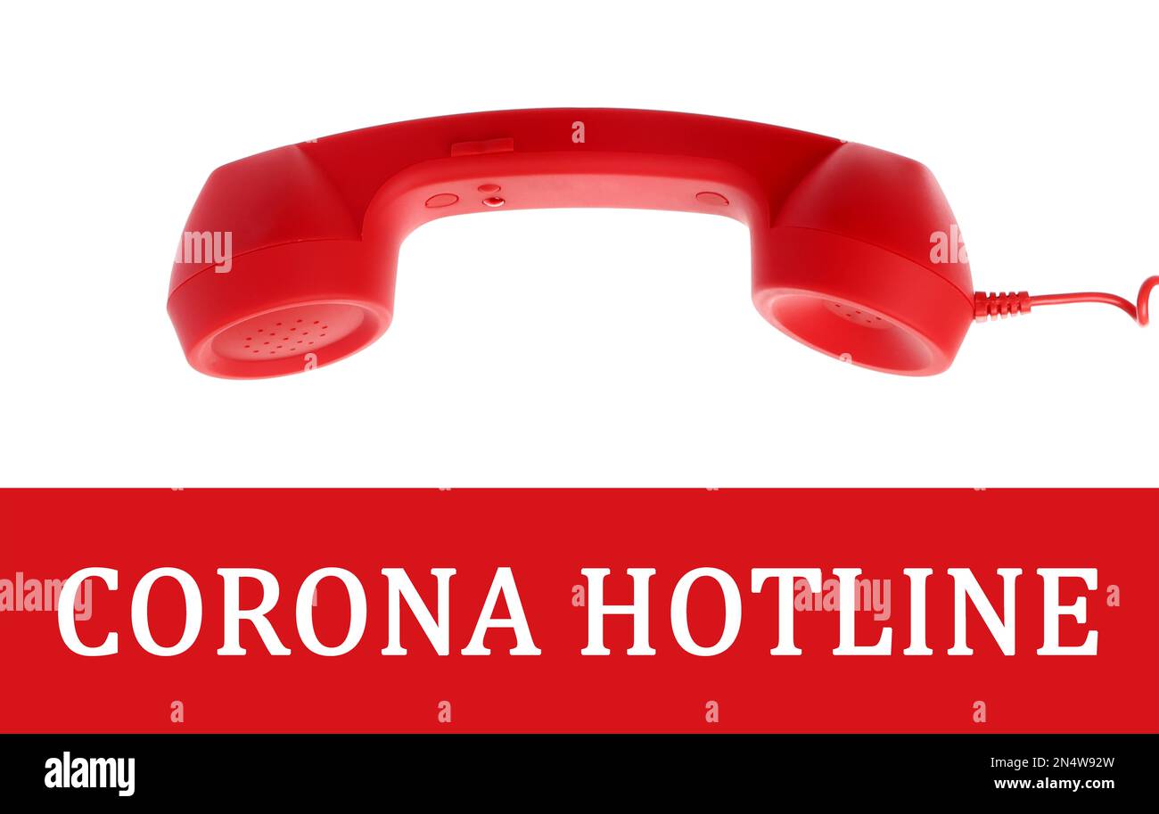 Covid-19 Hotline. Red handset and text on white background Stock Photo ...