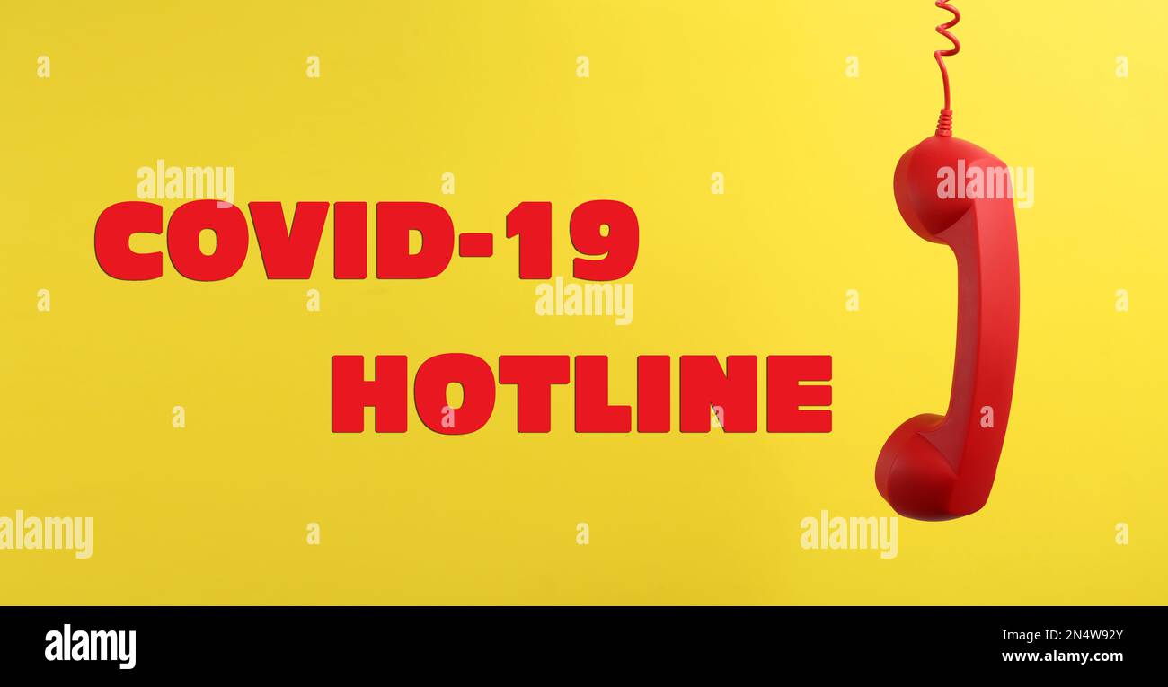 Covid-19 Hotline. Red handset and text on yellow background, banner ...