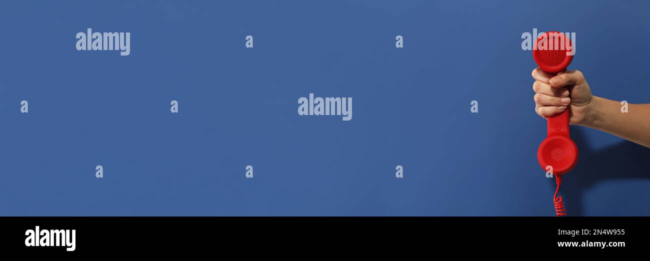 Hotline service. Woman with telephone receiver and space for text on ...