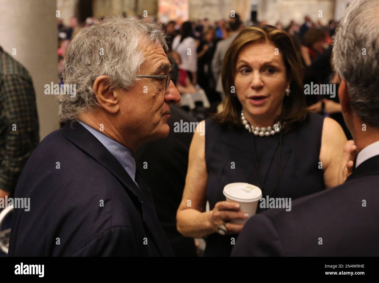 Actor Robert De Niro speaks with Christine A. Ferer, a member of the ...
