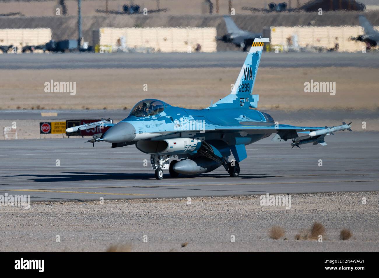 An F-16 Aggressor assigned to the 64th Aggressor Squadron, Nellis Air ...