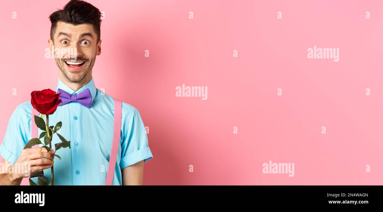Excited bearded man with moustache and bow-tie waiting for date with ...