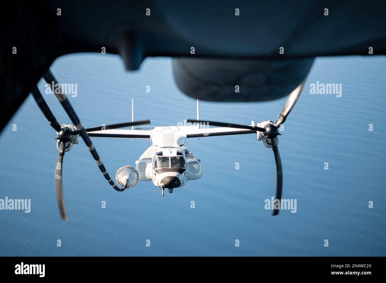 A U.S. Navy CMV-22B Osprey approaches a KC-10 Extender for refueling ...