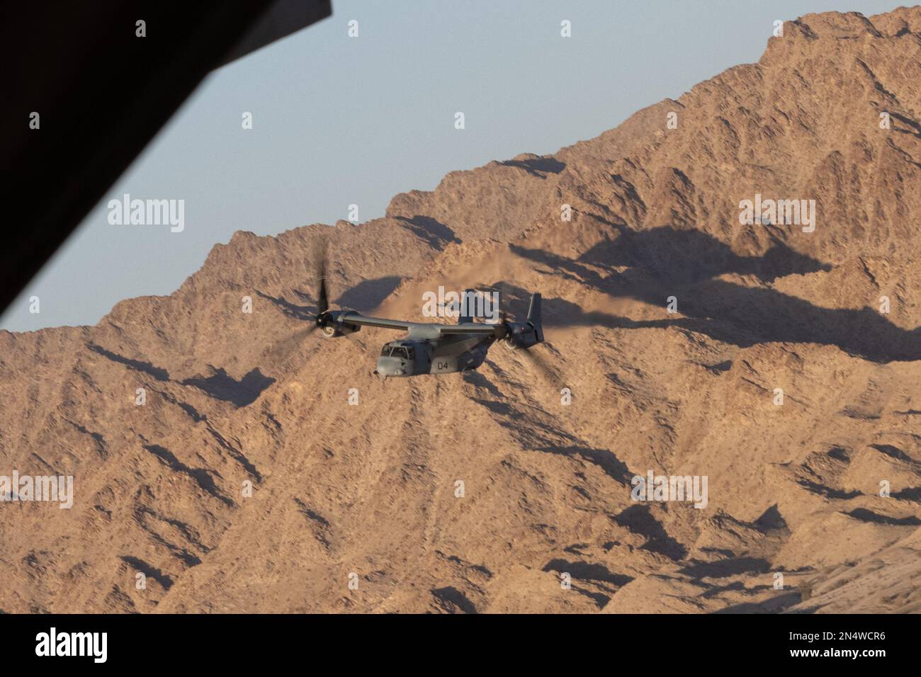 U.S. Marines with Marine Medium Tiltrotor Squadron (VMM) 261 fly an MV ...