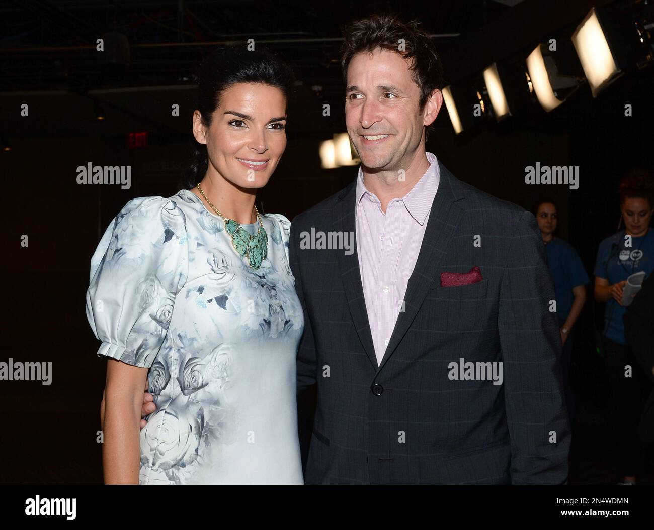 Actors Angie Harmon and Noah Wyle pose backstage at the TNT and TBS ...