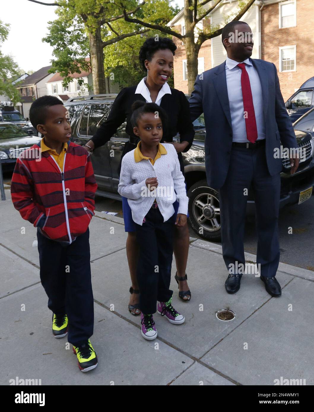 Newark mayoral candidate Shavar Jeffries, right, walks with his wife ...