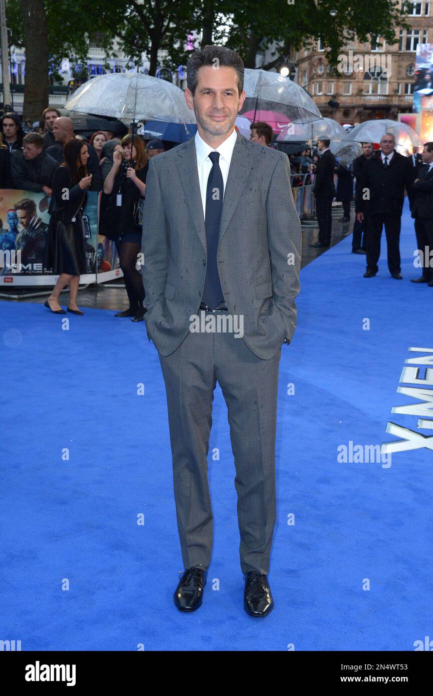 Producer Simon Kinberg poses for photographers on the red carpet for ...
