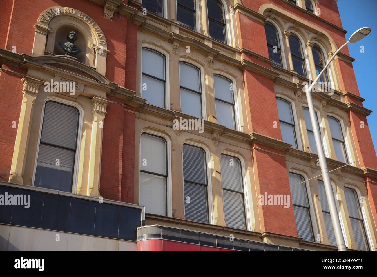 Old Brick building in urban city Stock Photo - Alamy