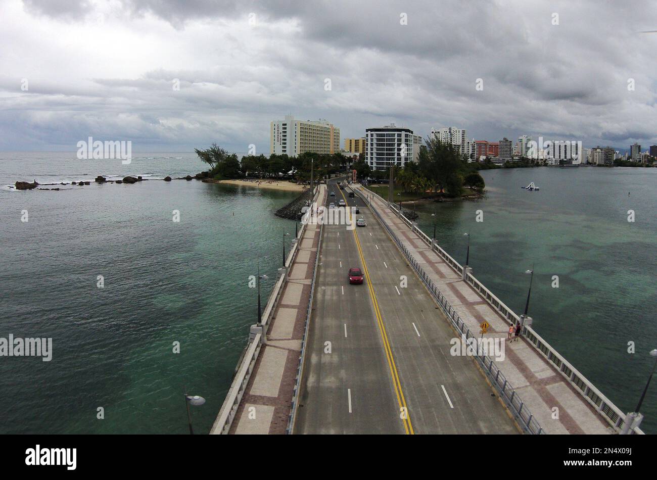 An aerial view taken from a drone of storm clouds hanging over the ...