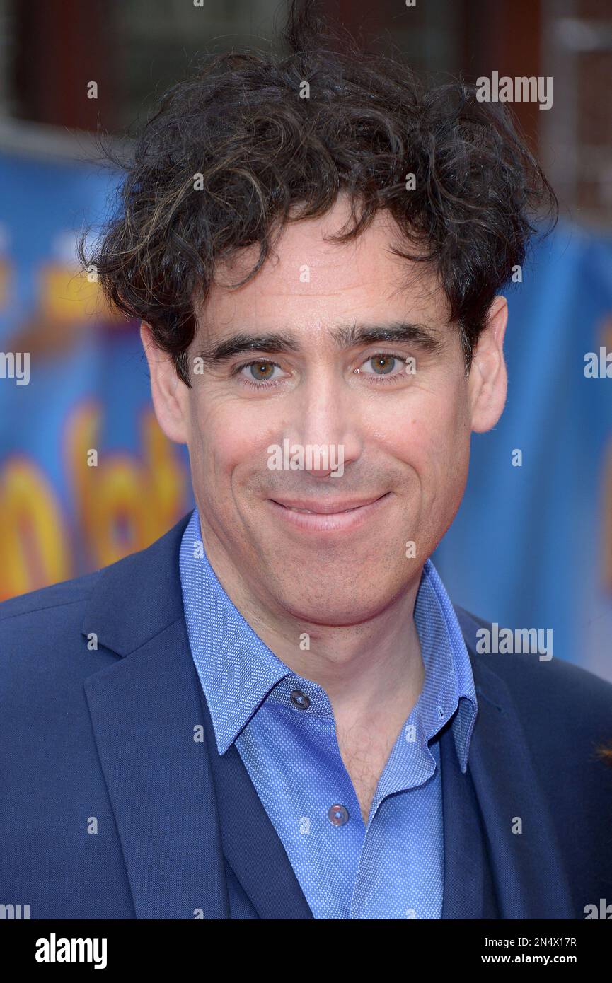 Stephen Mangan poses for photographers on the red carpet for Postman ...