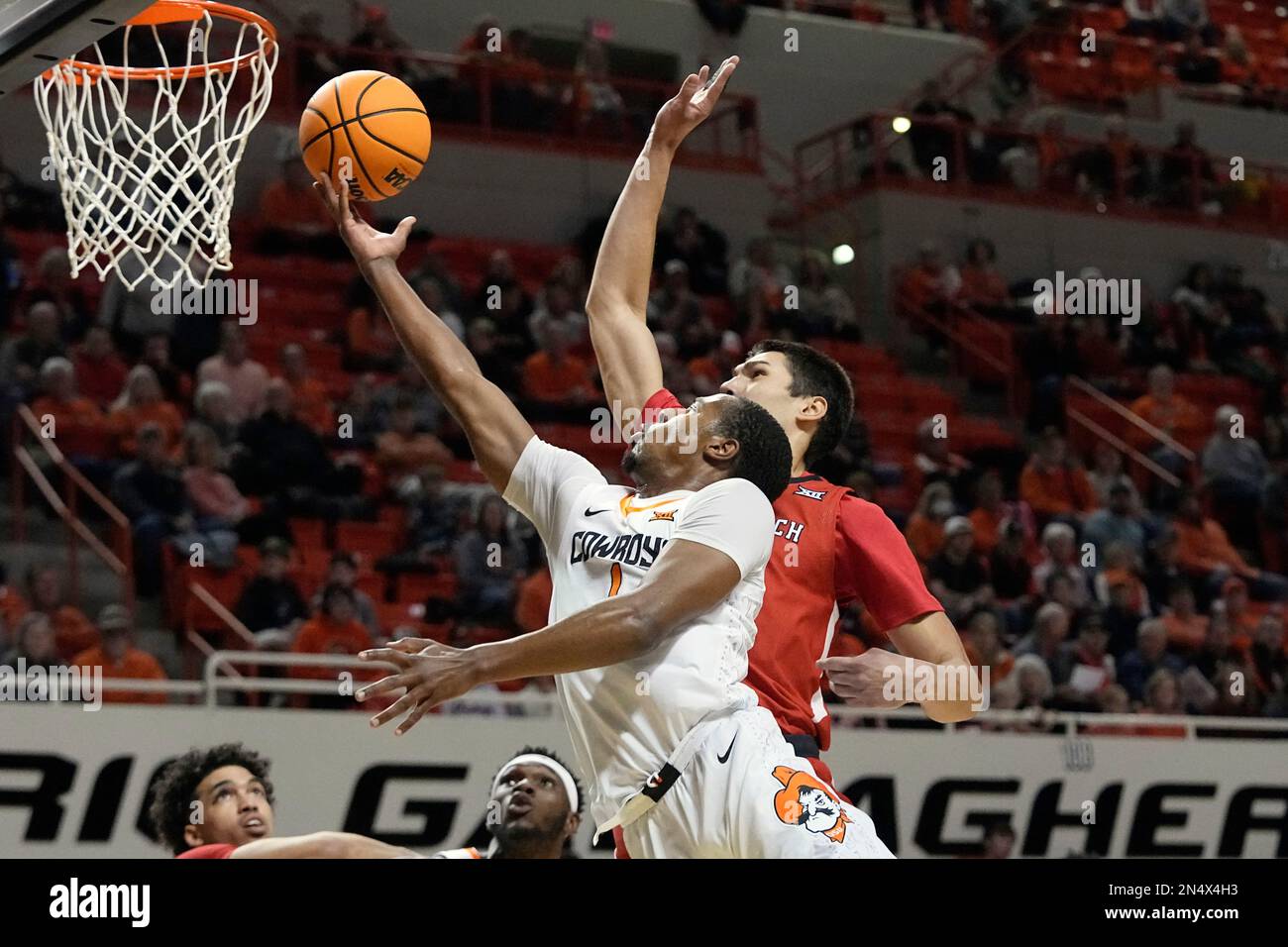 Oklahoma State guard Bryce Thompson (1) shoots in front of Texas Tech ...