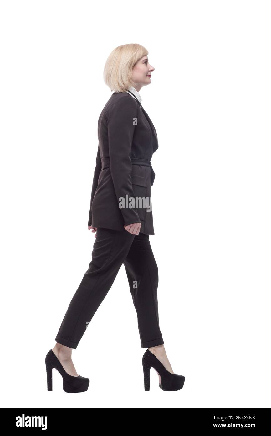 in full growth. confident business woman striding forward Stock Photo ...
