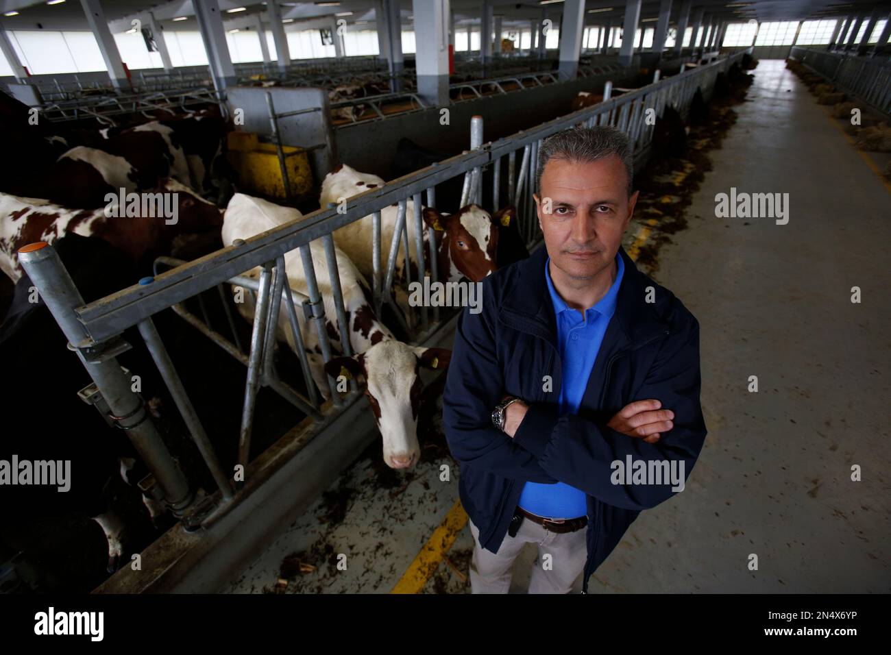 In this photo taken on Tuesday, April 15, 2014, Bosnian farmer Jusuf ...