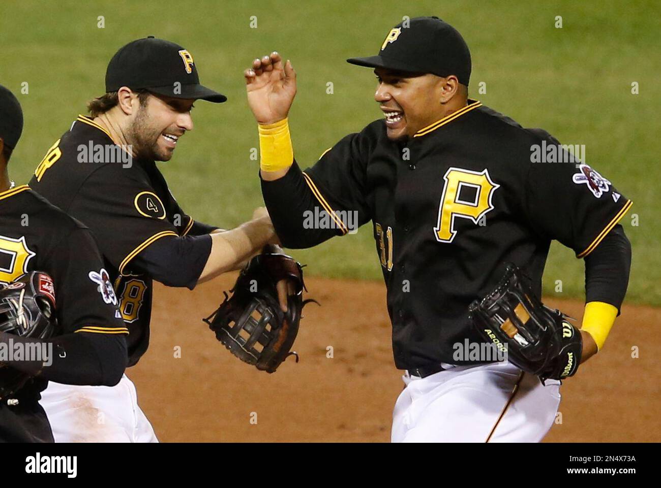 Pittsburgh Pirates' Neil Walker, left, and Jose Tabata celebrate after ...