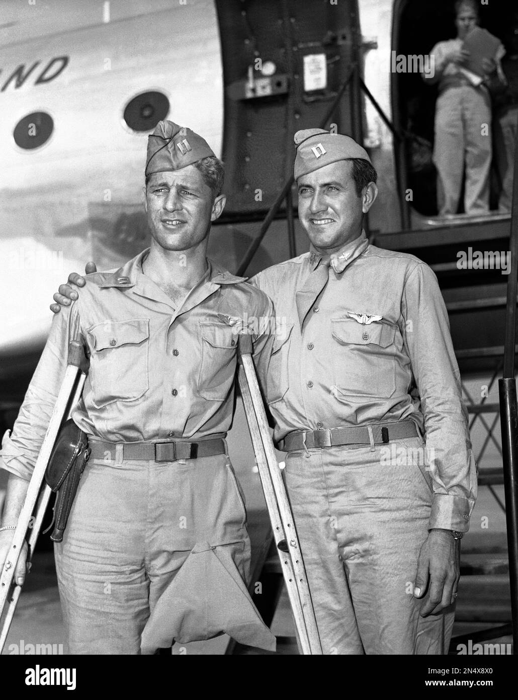 FILE - In this Oct. 3, 1945 file photo, Capt. Louis Zamperini, right ...