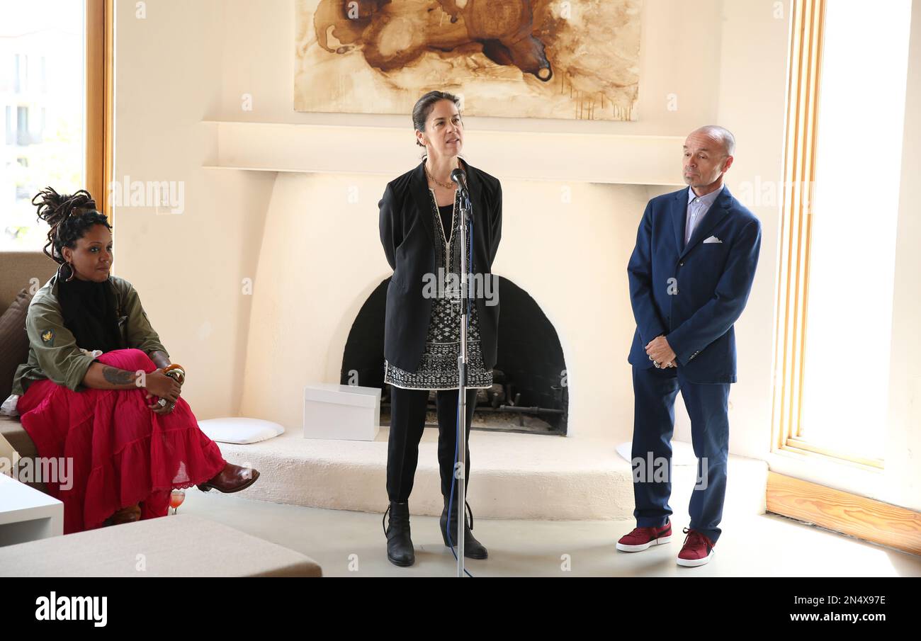 Connie Butler, senior curator of the Hammer Museum, center, presents ...