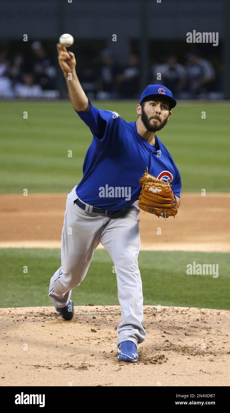 Chicago Cubs starting pitcher Jake Arrieta delivers during the first ...