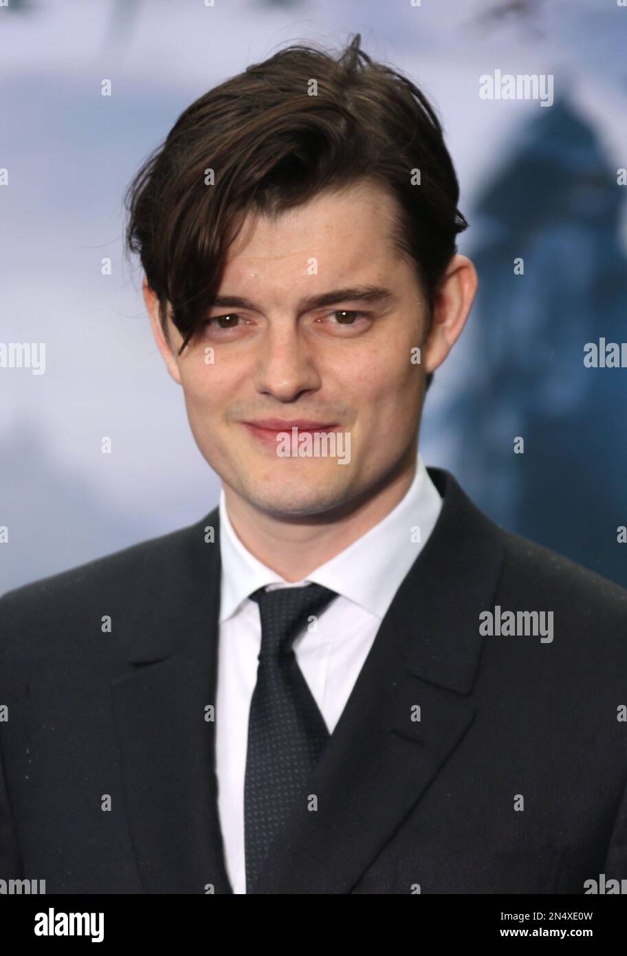 British actor Sam Riley poses for photographers as they arrive for the ...
