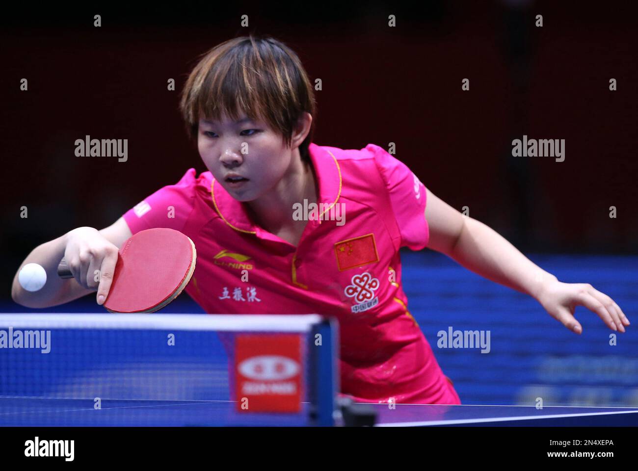 Zhu Yuling of China plays against Li Siyun of Singapore during their ...