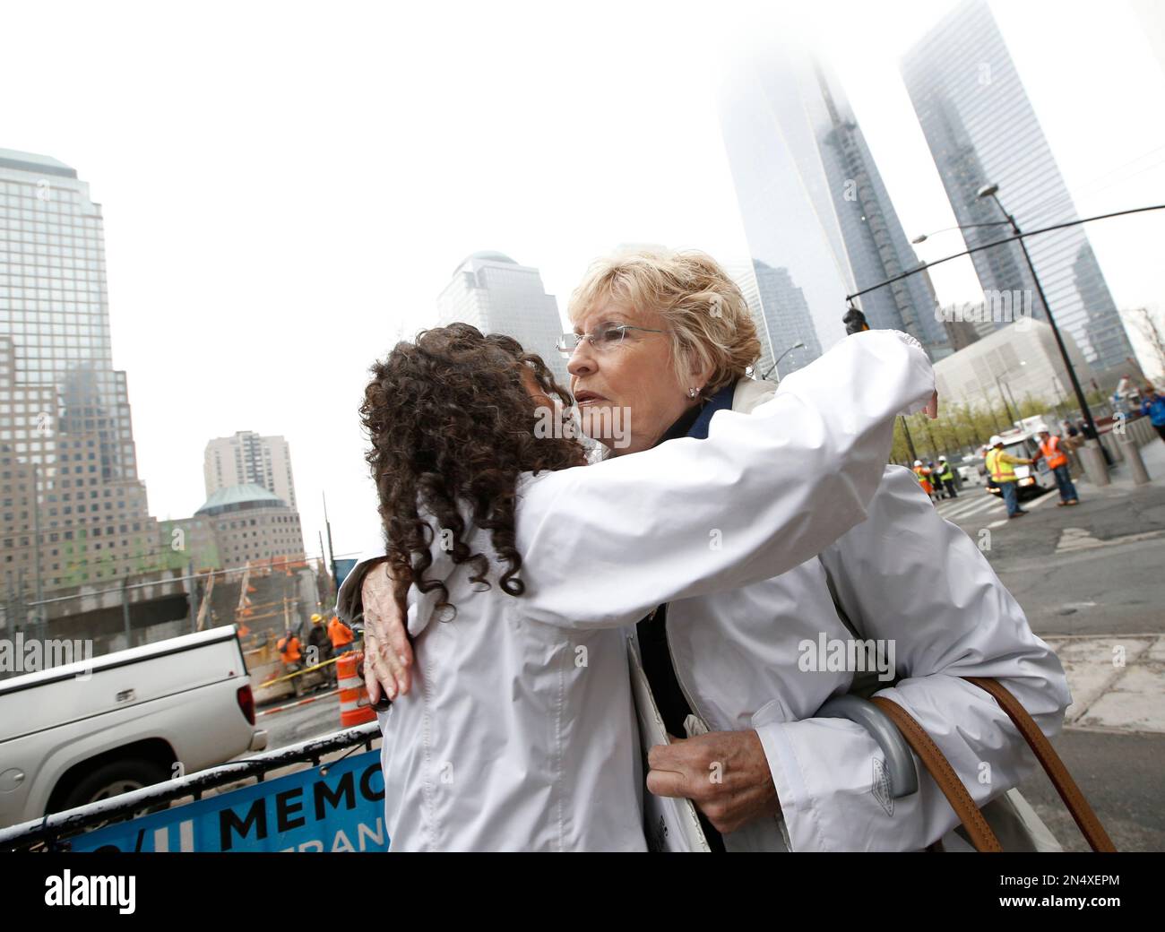 Rosaleen Tallon, left, sister of firefighter Sean Tallon killed in the ...