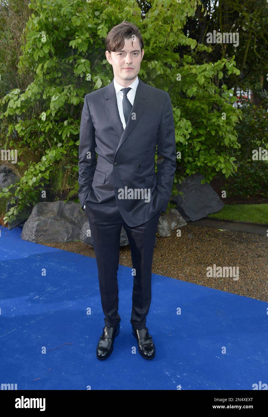Actor Sam Riley arrives at the Maleficent exhibit in Kensington Gardens ...