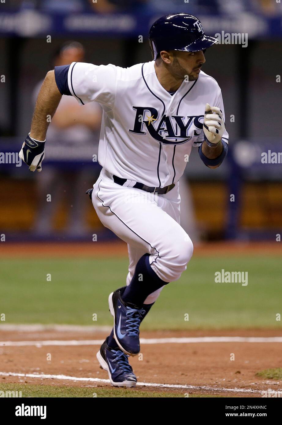Tampa Bay Rays' Sean Rodriguez heads for first base after hitting a ...