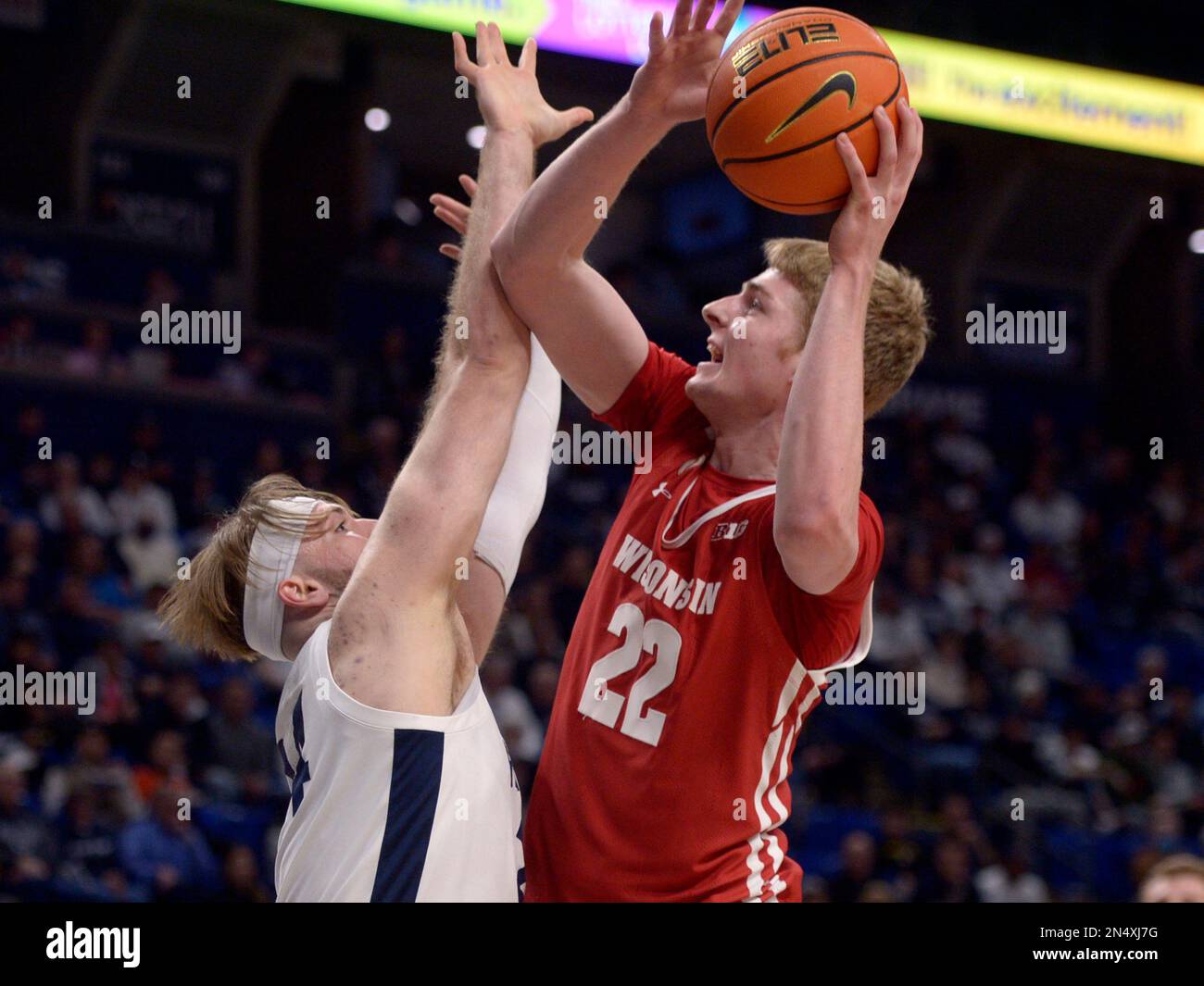 Wisconsin's Steven Crowl (22) shoots on Penn State's Michael Henn (24 ...