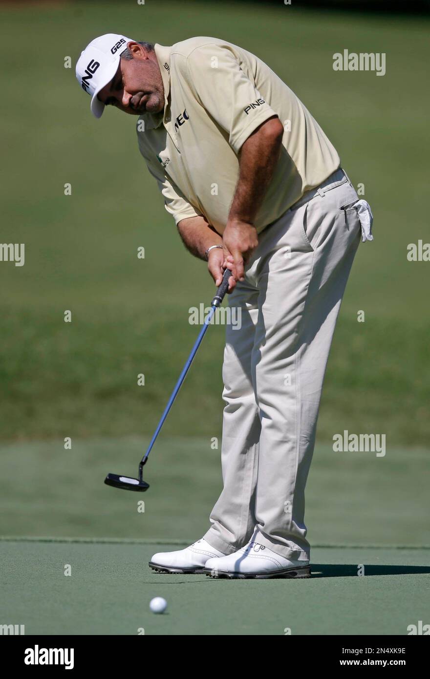 Angel Cabrera putts on the ninth green during a practice round for The ...