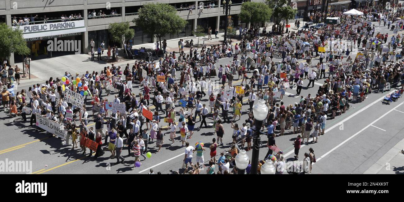 FILE - In this June 2, 2013 file photo, members of the Mormons Building ...