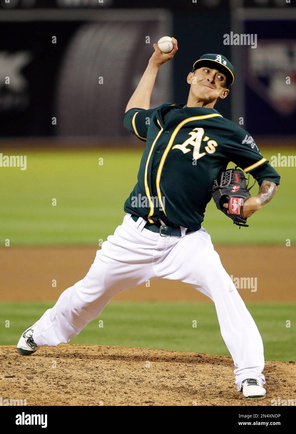 Oakland Athletics starting pitcher Jesse Chavez throws to the Seattle ...