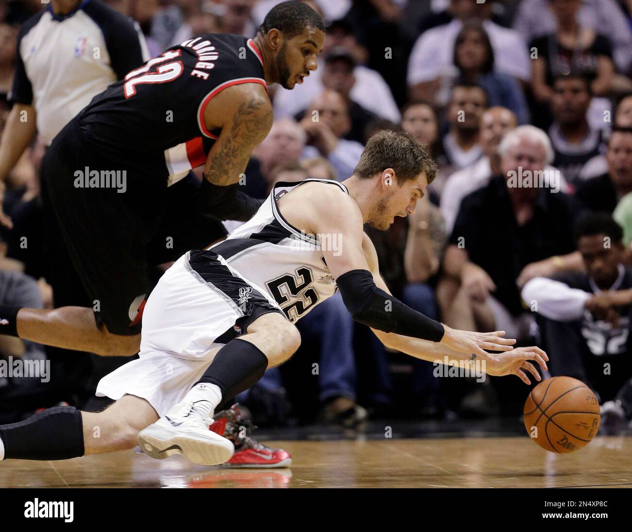 San Antonio Spurs' Tiago Splitter (22), of Brazil, and Portland Trail ...