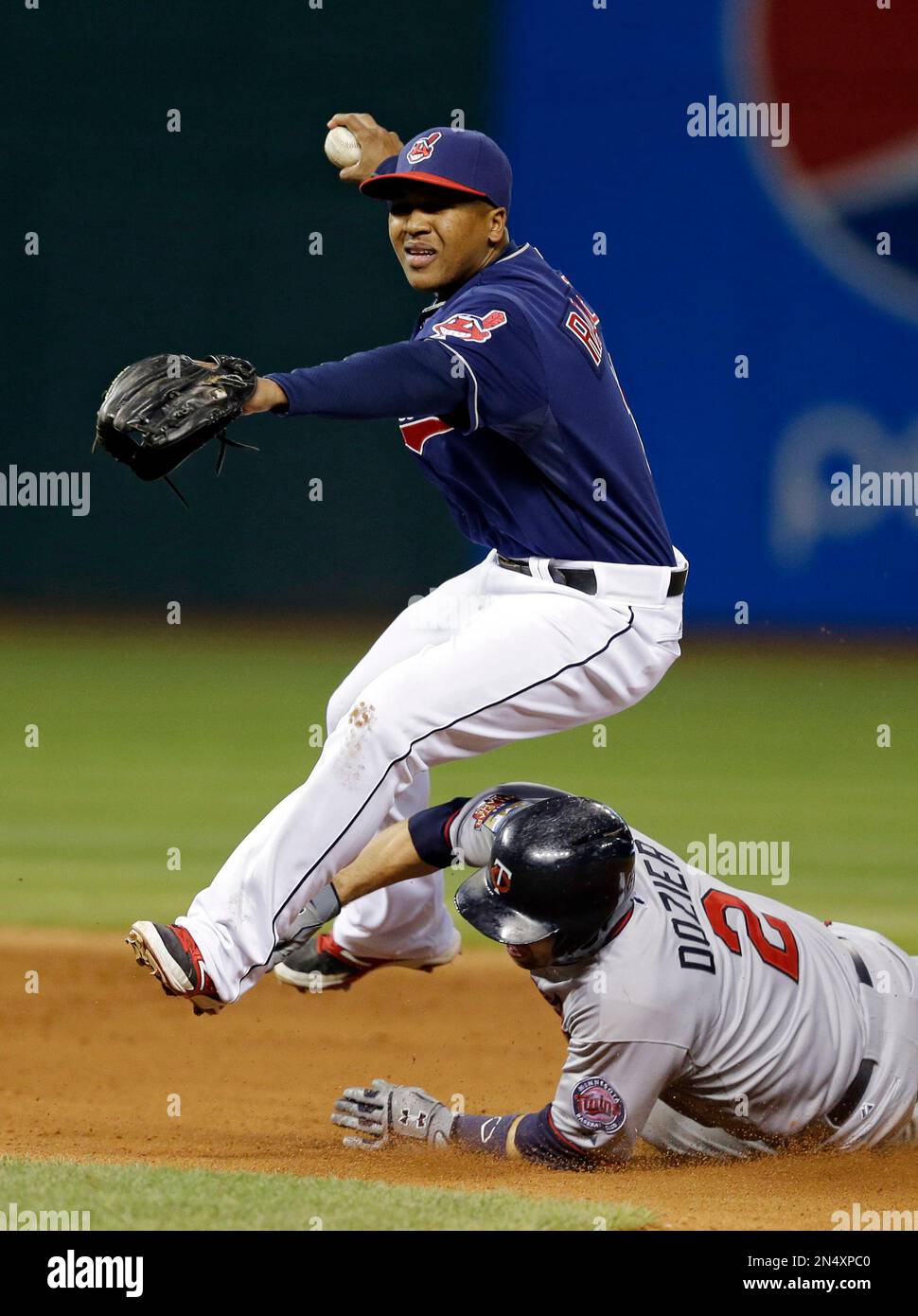 Minnesota Twins' Brian Dozier (2) prevents Cleveland Indians second ...