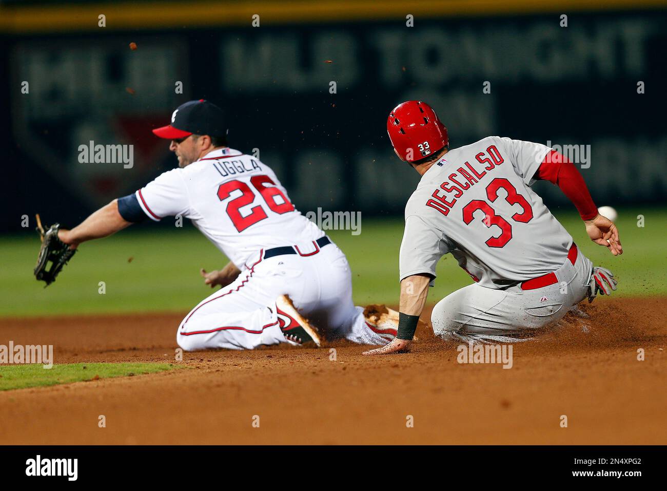 St. Louis Cardinals shortstop Daniel Descalso (33) steals second base ...
