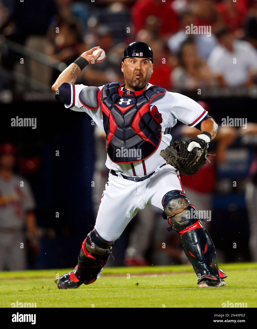 Atlanta Braves catcher Gerald Laird (11) throws out St. Louis Cardinals ...