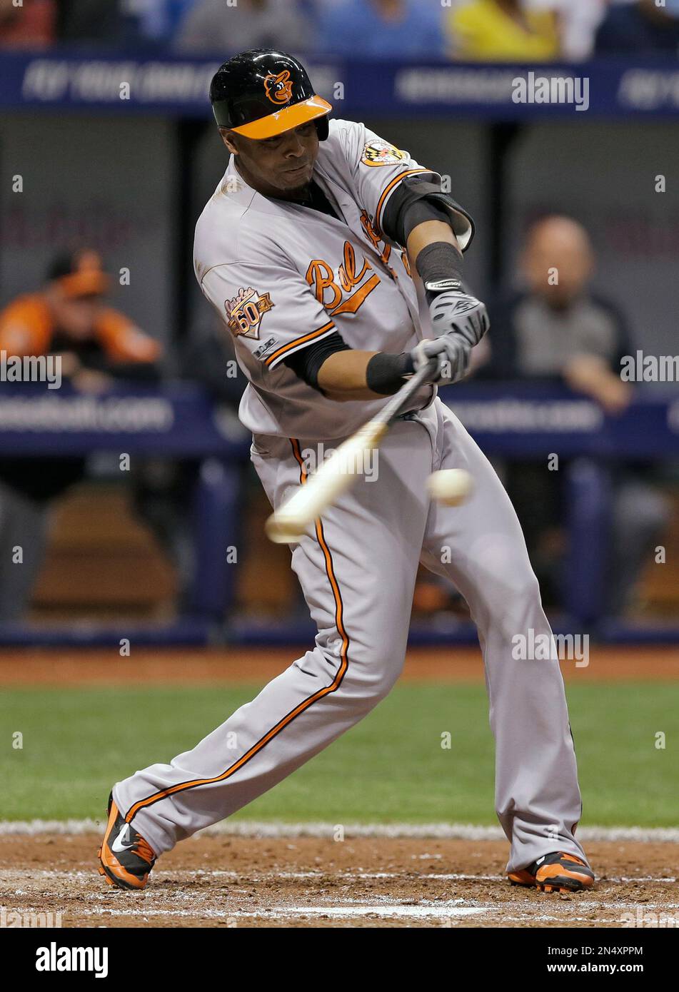 Baltimore Orioles' Nelson Cruz his a single off Tampa Bay Rays starting ...