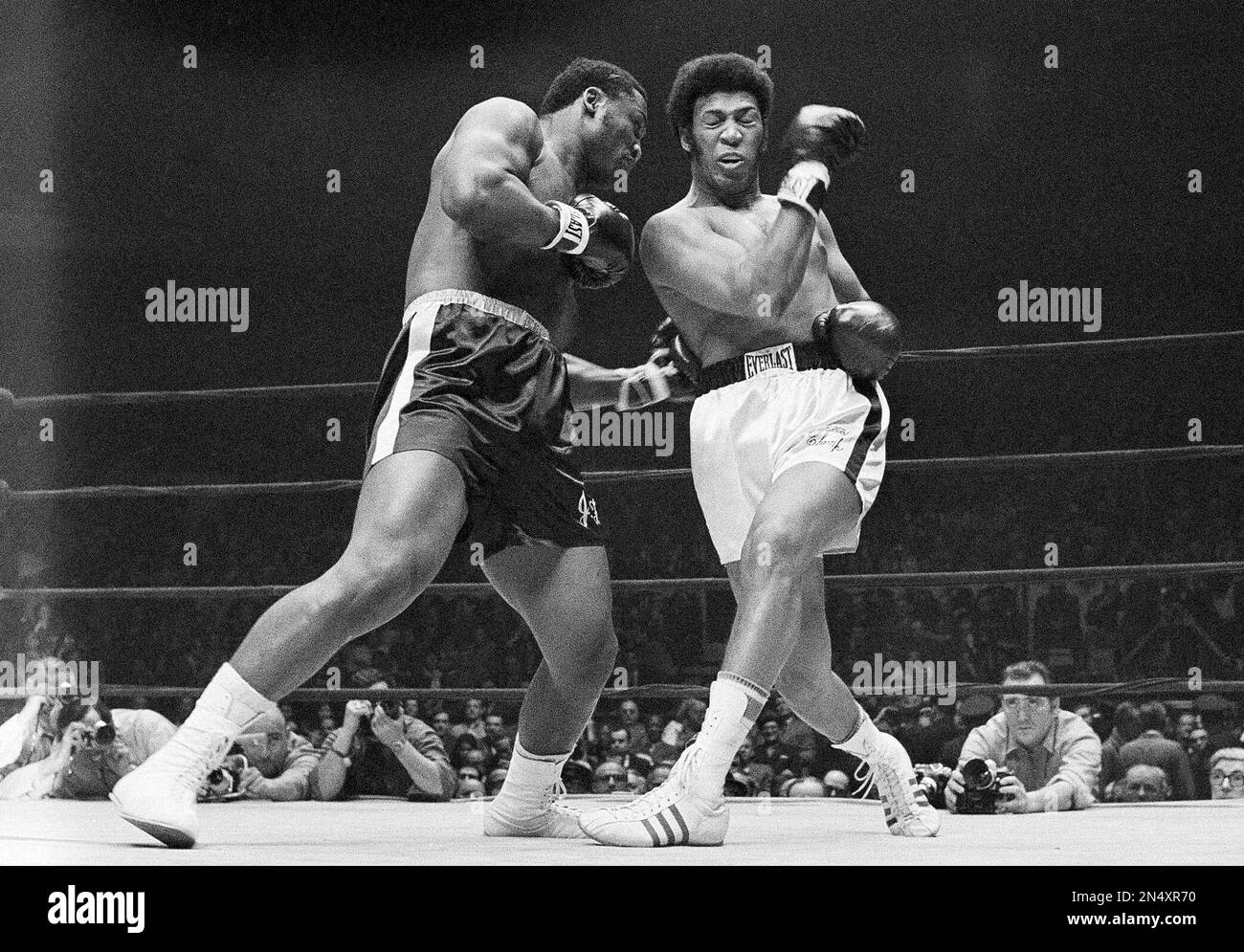 FILE - In this Feb. 16, 1970, file photo, Joe Frazier connects to the ...