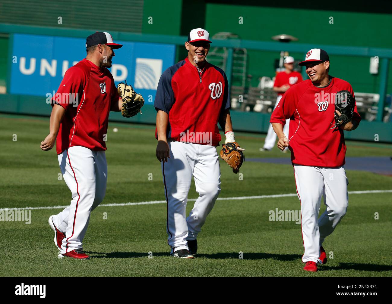Washington Nationals catchers Sandy Leon, left, Wilson Ramos, and Jose ...