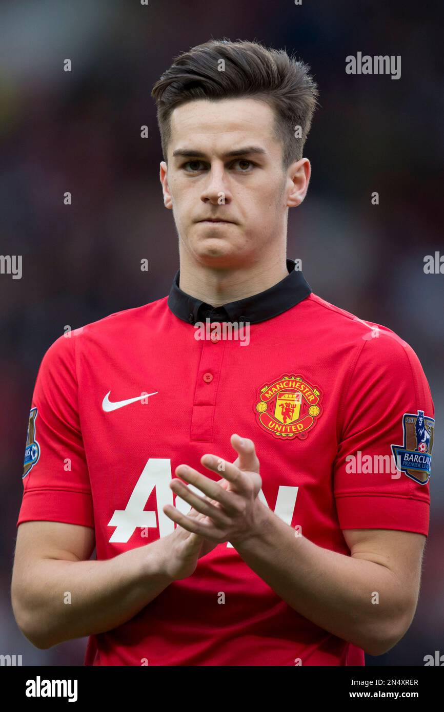 Manchester United debutant Tom Lawrence takes to the pitch before his ...